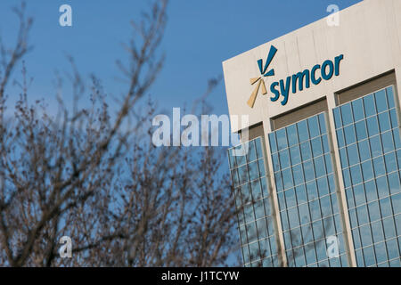 A logo sign outside of the headquarters of Symcor in Mississauga ...