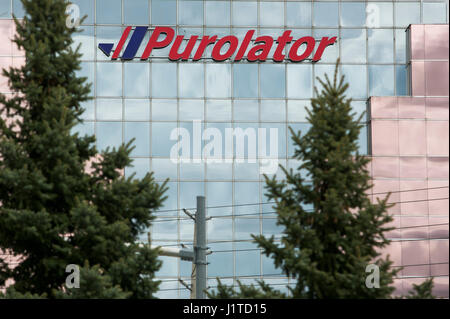 A logo sign outside of the headquarters of Purolator Inc, in ...