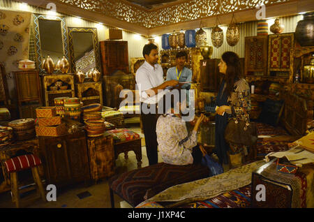 Lahore, Pakistan. 23rd Apr, 2017. Pakistani people takes interest in ...