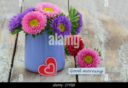 Good morning card with red mug of coffee and coffee beans on rustic ...