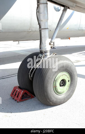 Airplane wheel. Small military jet wheel Stock Photo - Alamy