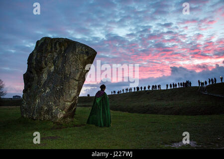 People gather to watch the sunrise on New Years Day at Bondi Beach, in ...