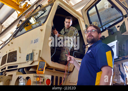 Wheeled vehicle mechanics from the 8th Military Police Brigade attend a ...