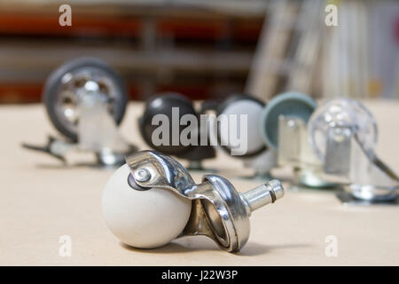 Wheel for sofa and tables. Roller for furniture Stock Photo - Alamy
