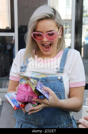 British singer Anne-Marie Nicholson leaving Eins Live Studios with pink ...