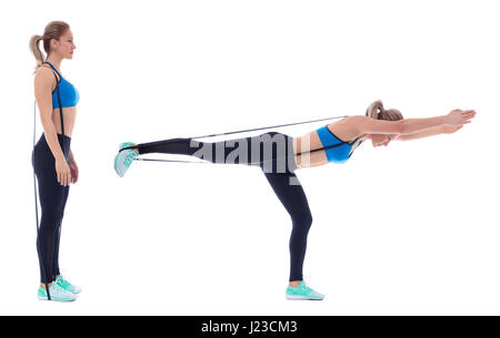 Elastic band exercises executed with a professional trainer Stock Photo ...