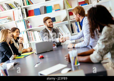 Male with businesswoman are signed successful contract and satisfied of ...