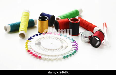 Threads, pins, needles - sewing tools Stock Photo - Alamy