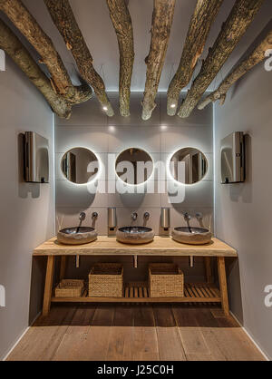 Empty wooden table in restroom, closeup Stock Photo - Alamy