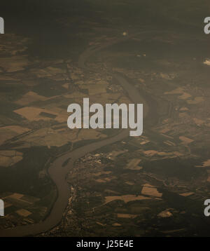Amazing view from the airplane window during the sunset over mountains ...