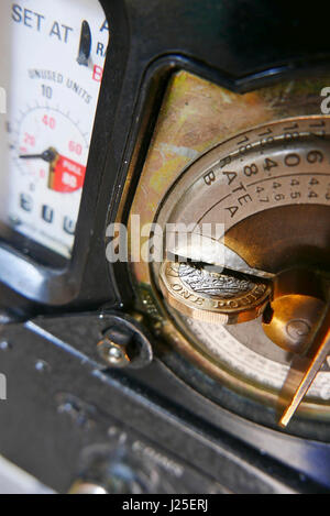 Old style coin operated electricity meter Stock Photo - Alamy
