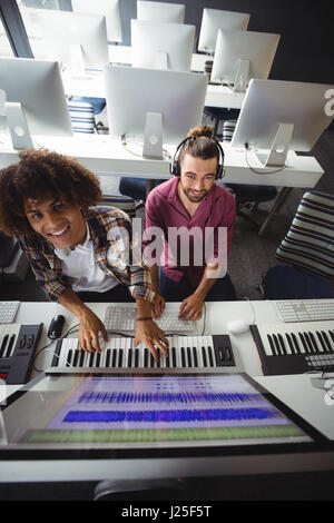 Top view of two sound engineers working together Stock Photo - Alamy
