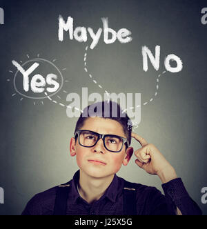 Portrait of thoughtful guy making choice. Handsome man thinking on ...