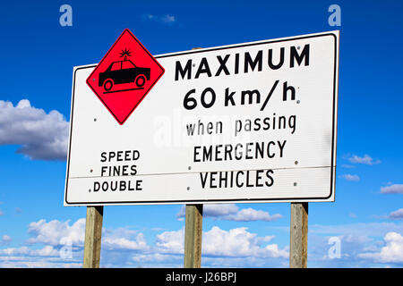 Maximum speed while passing emergency vehicles sign Stock Photo - Alamy