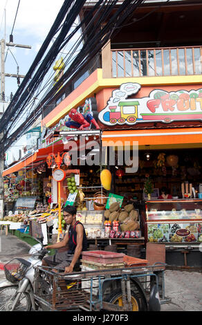 Retail shops on Chaweng, Koh Samui, Thailand. Showing the power cables ...