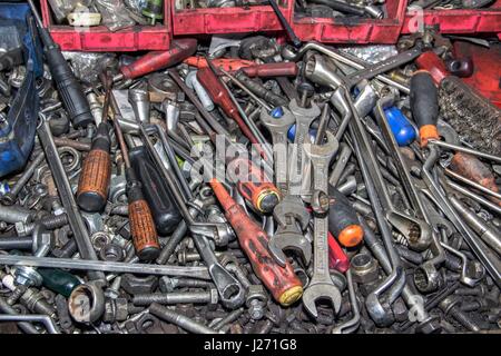 Bunch of messy tools in a garage Stock Photo - Alamy