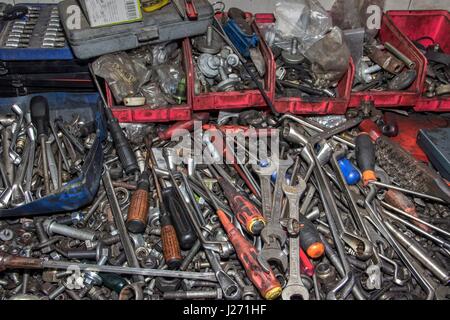 Bunch of messy tools in the garage Stock Photo - Alamy