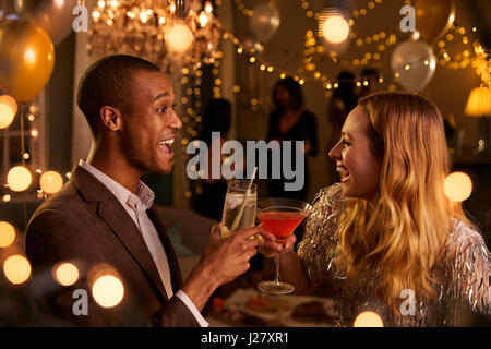 Couple Make Toast As They Celebrate At Party Together Stock Photo - Alamy