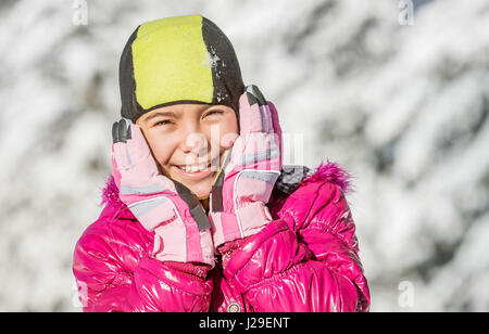 Child wearing a ski mask covered in snow Stock Photo - Alamy