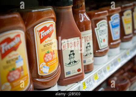 Shelf with food in a supermarket. Ketchup and other sauces Stock Photo ...