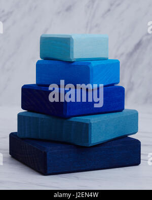 Pile of toys on blue background Stock Photo - Alamy