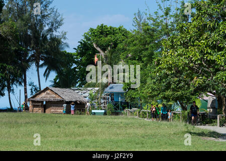Melanesia, Papua New Guinea, Dobu Island. Typical village thatched home ...