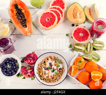 Wooden box with different vegetables and fruits on white table Stock ...