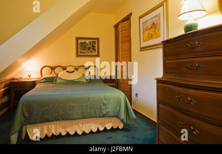 A bedroom in a 1970's style house which was featured in a 1975 Stock ...