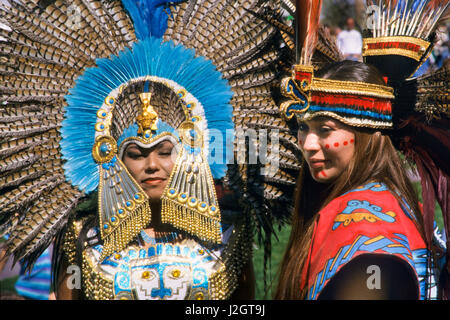 Two Aztec women dressed in magnificent traditional Aztec regalia and ...