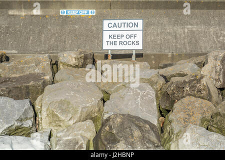 keep off the rocks sign England UK Stock Photo - Alamy