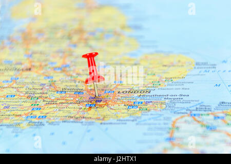 Map of the UK with a red push pin stuck in London Stock Photo - Alamy
