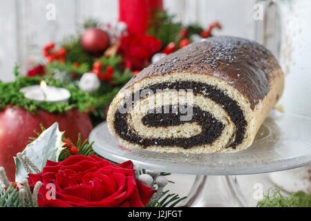 Festive poppy seed cake. Party dessert Stock Photo - Alamy