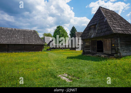 Typical traditional romanian houses and barns on display at the village ...