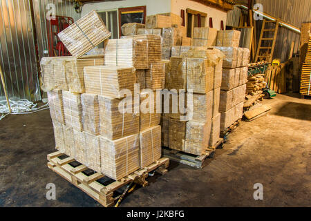 Warehouse packed with variety of timber for construction and repair ...