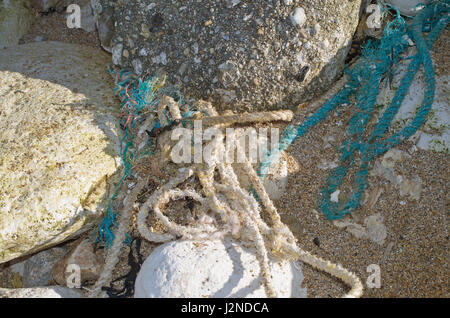 Discarded Blue and White Rope Washed up on beach Stock Photo - Alamy