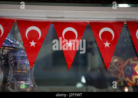 Triangle shaped Turkish national flags are attached to a rope Stock ...