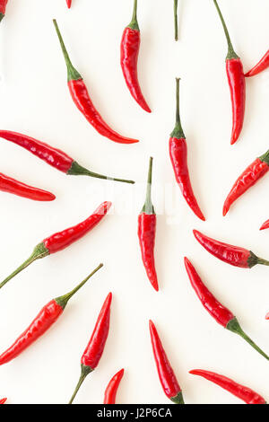 A few pods of ripe organic, spicy green hot pepper, close-up, with a ...