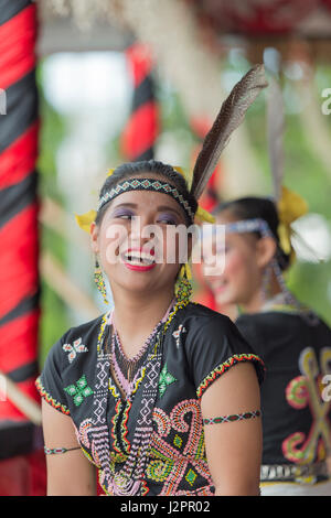 :Murut lady in traditional costume decorated with colorful beads during ...