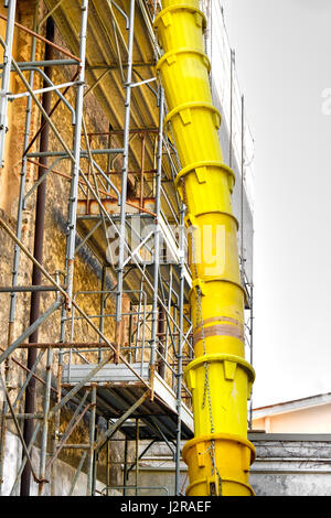 discharge debris tube yard building Stock Photo - Alamy