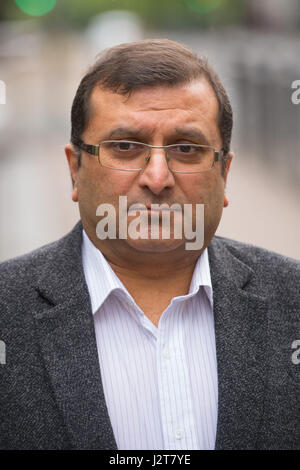 Embargoed until 0001 Tuesday May 2 Ihsan Bashir (left) with the head of ...