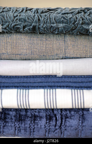 Pile of folded and textured bedding Stock Photo - Alamy