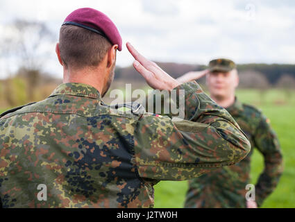 two german soldiers salute each other Stock Photo - Alamy