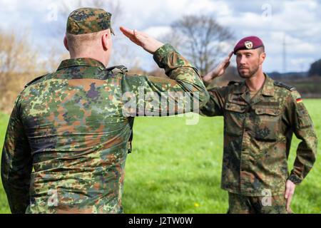 two german soldiers salute each other Stock Photo - Alamy