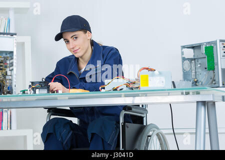Portrait of disabled computer technician Stock Photo - Alamy