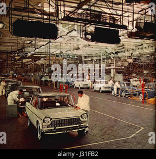 Car production line, skilled workers are working tense Stock Photo - Alamy