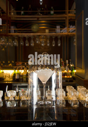 Glass of cocktail with smock at the bar Stock Photo - Alamy