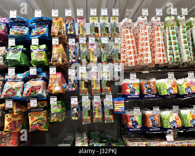 Colorful candy shop display featuring sweet dessert treats clear bin ...