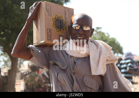 On January 15, 2017, residents of Goobweyn in Somalia waited to receive ...