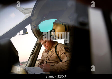 Air Interdiction Agent Cliff Anders performs a pre-flight check of his ...