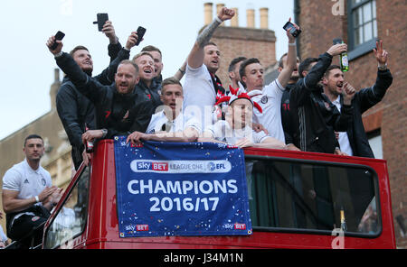 Sheffield United players arrive on an open top bus during the promotion ...